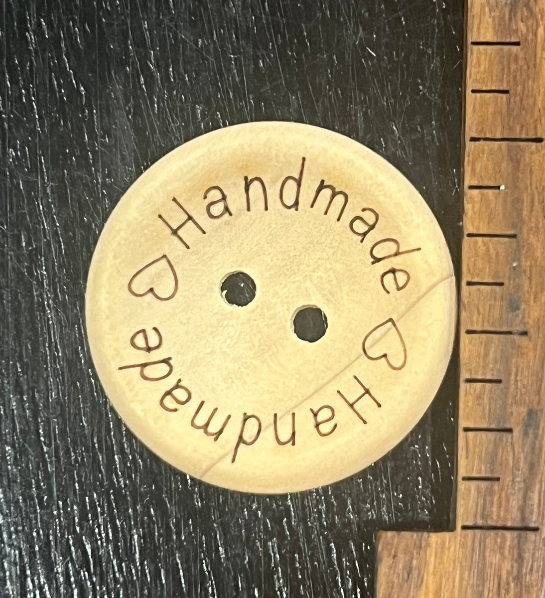 1 inch wooden button, two hole, ‘Handmade’ written twice – Hot Springs ...